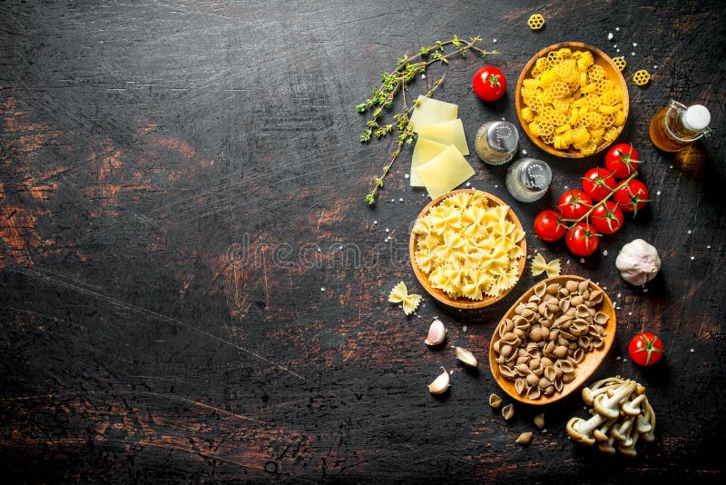 Different Types of Raw Paste with Thyme, Tomatoes and Mushrooms Stock ...