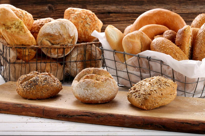 Different Types of Rolls on Wooden Background Stock Photo - Image of ...