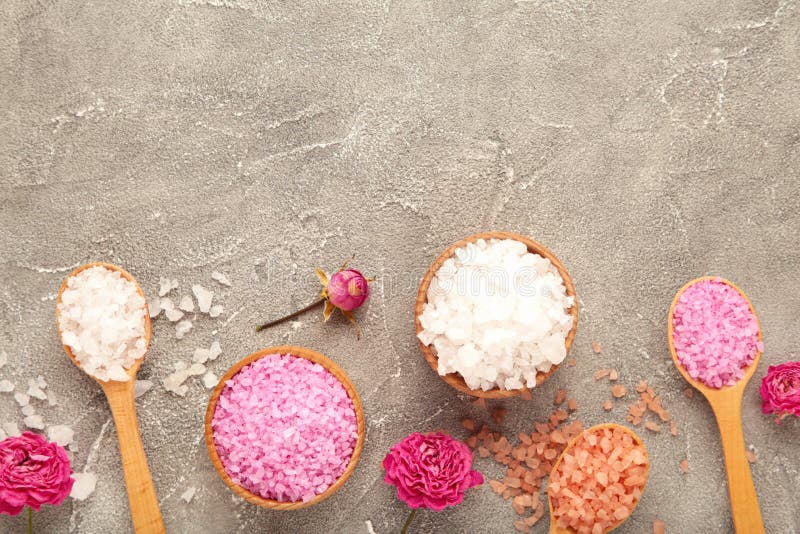 Different Types of Salt with Roses on Grey Background Stock Image ...