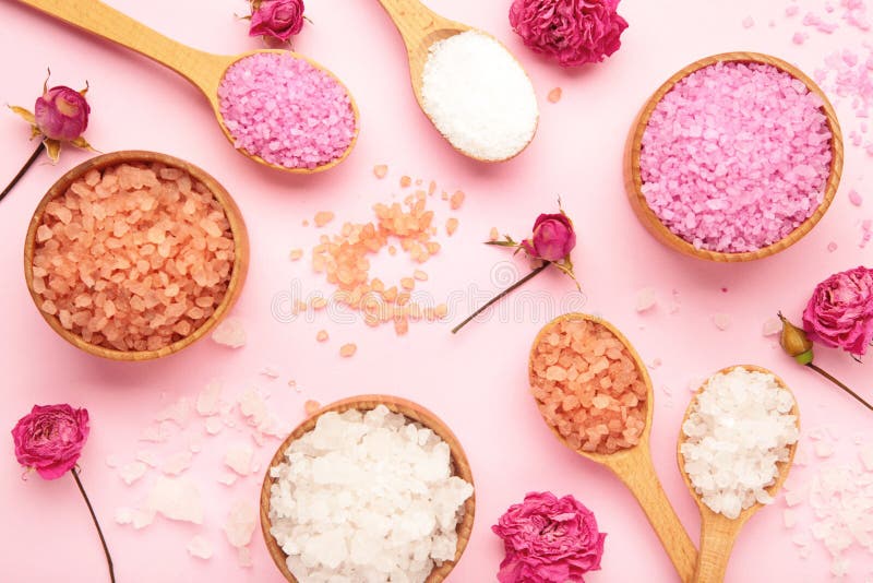 Different Types of Salt with Roses on Pink Background Stock Photo ...