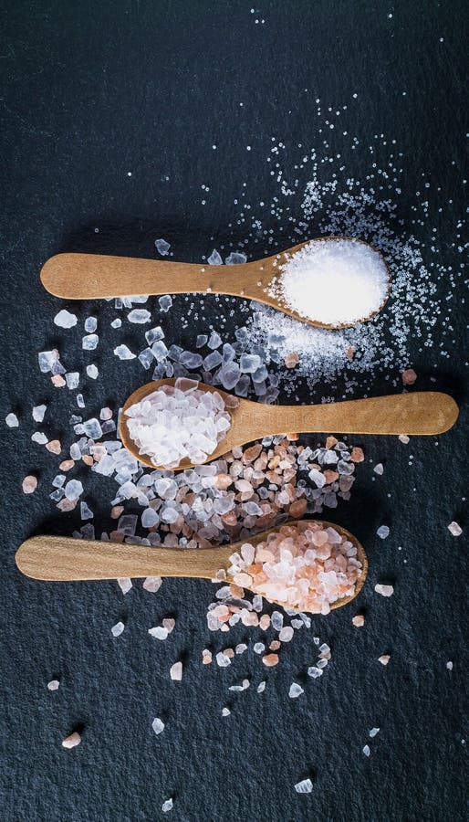 Different Types of Salt. Top View on Two Wooden Spoons Stock Photo ...