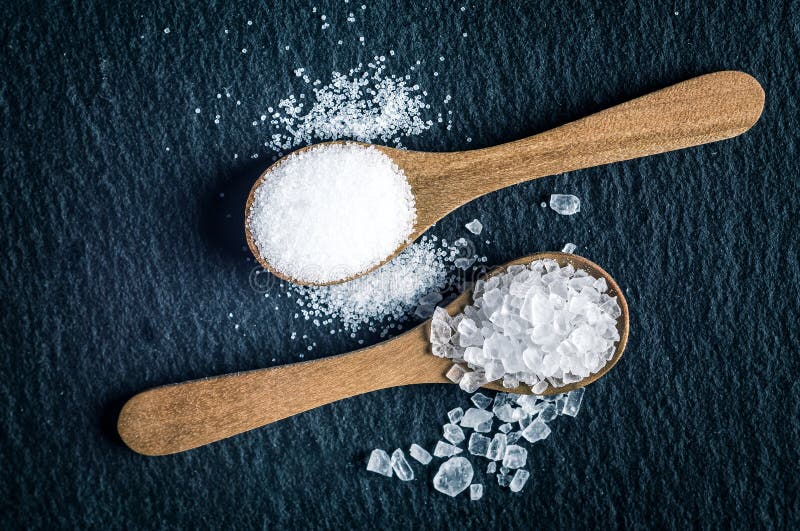 Different Types of Salt. Top View on Two Wooden Spoons Stock Photo ...