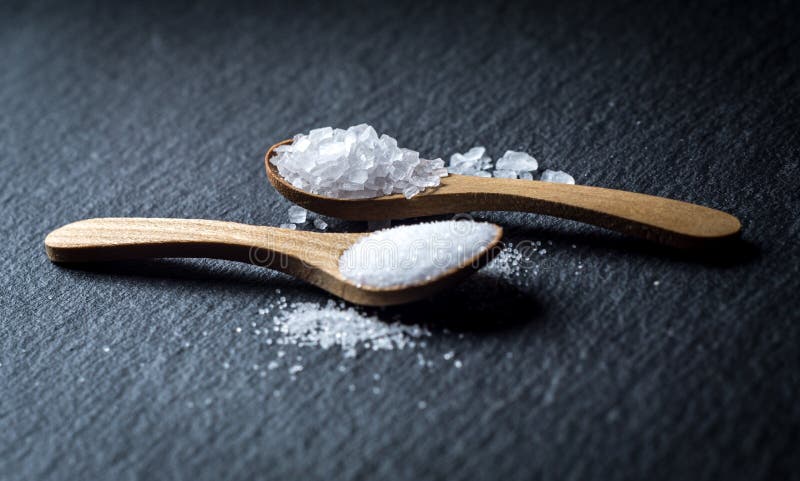 Different Types of Salt. Top View on Two Wooden Spoons Stock Photo ...
