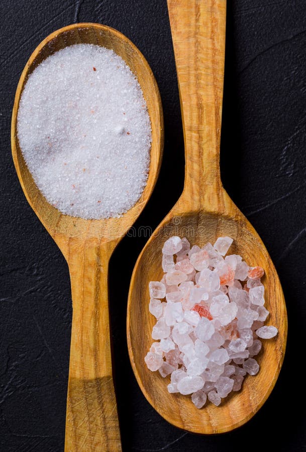 Different Types of Salt in Two Wooden Spoons Stock Photo - Image of ...