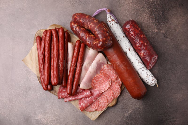 Different Types of Sausages on Brown Table, Flat Lay Stock Image ...