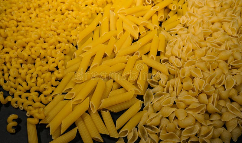Different Types and Shapes of Dry Italian Pasta. Pasta Background ...