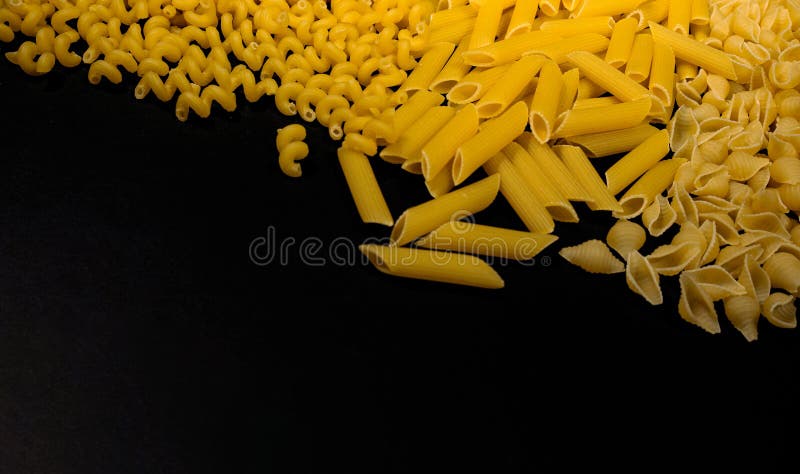 Different Types and Shapes of Dry Italian Pasta. Pasta Background with ...