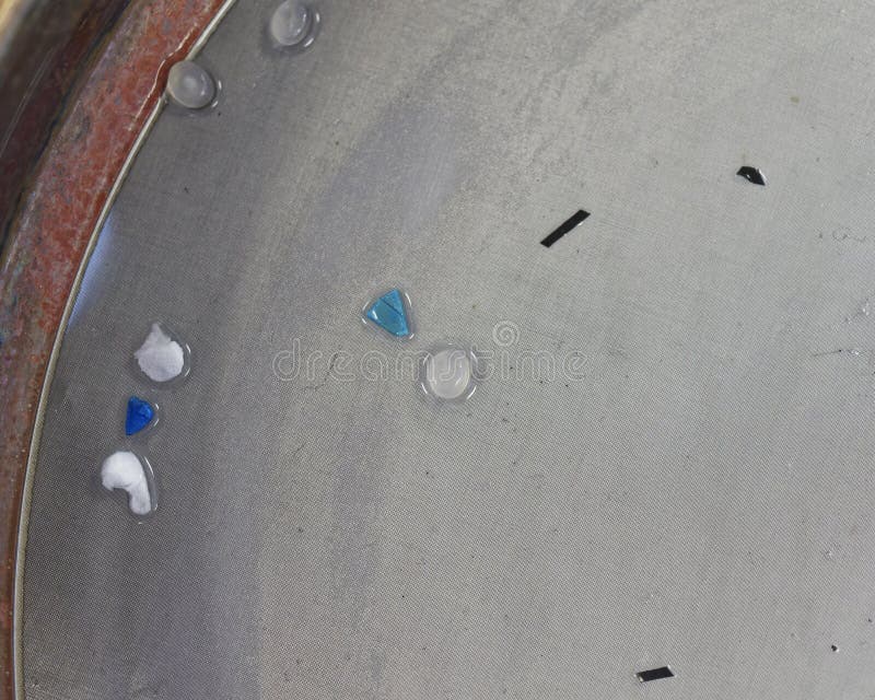 Microplastics on a sieve stock photo. Image of dump - 244666040