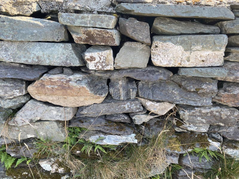 Different Types of Stone and Slate in a Dry Stone Wall Stock Photo ...