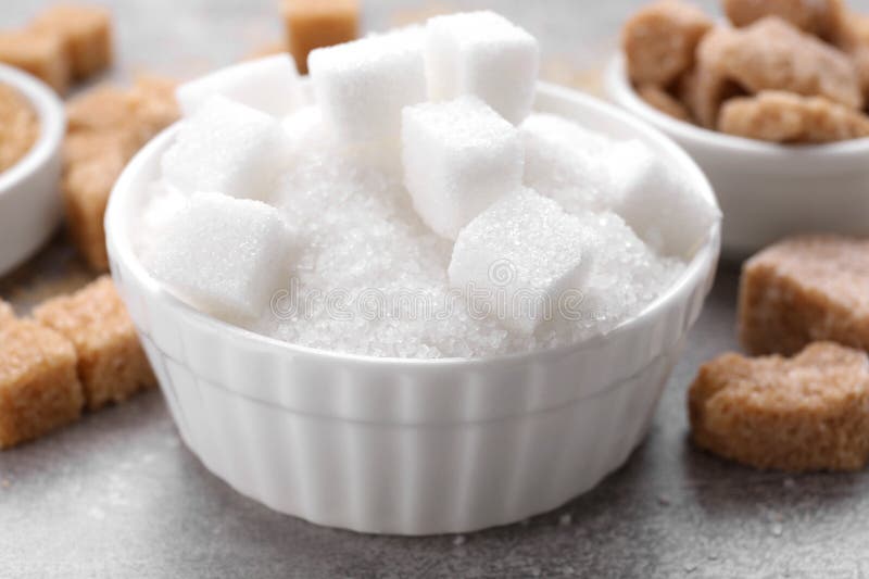 Different Types of Sugar on Grey Table, Closeup Stock Photo - Image of ...
