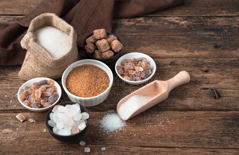 Different Types of Sugar on a Natural Wooden Background. Stock Image ...