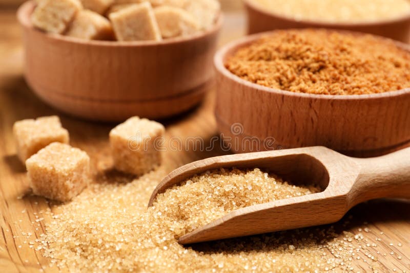 Different Types of Sugar on Wooden Table, Closeup Stock Photo - Image ...