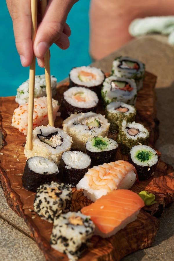 Assorted Sushi on a Board Near the Pool Stock Image - Image of japan ...