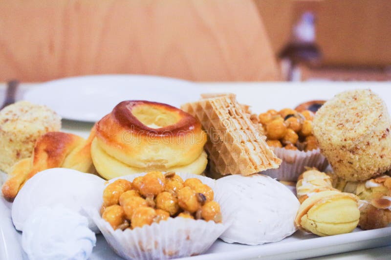 Different Types of Sweet Pastries on Plates Stock Photo - Image of ...