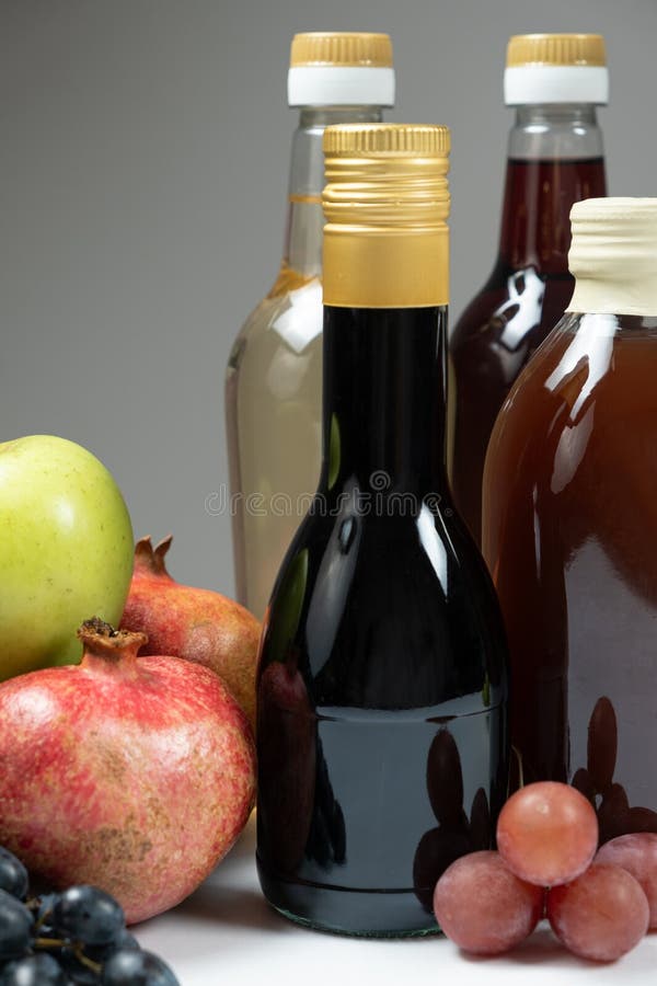 Different Types of Vinegar. Balsamic, Pomegranate and Apple Vinegars in ...