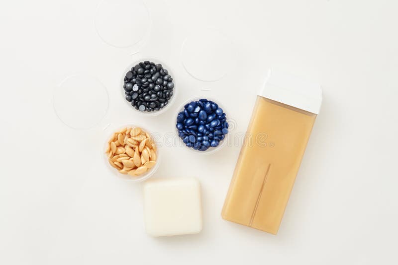 Different Types of Wax for Depilation Top View on a White Background ...