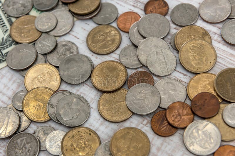 Different Us Cent, One Dollar Coin on Wooden Desk Stock Image - Image ...