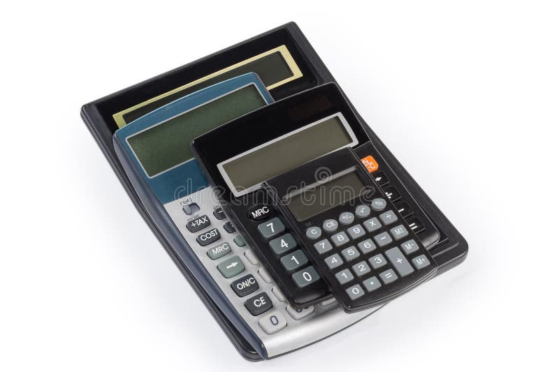Different Used Electronic Calculators Stacked on a White Background ...