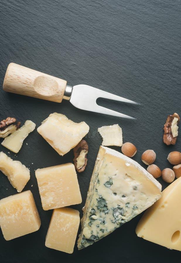 Different Varieties of Cheese. Stock Photo - Image of parmigiano ...