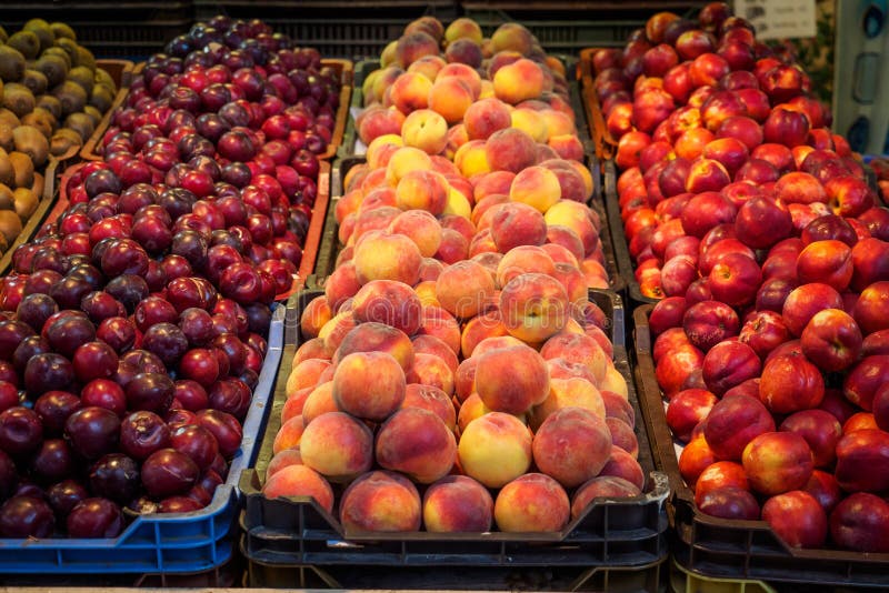 Different Varieties of Peaches on Sale in a Local Market. Stock Photo ...