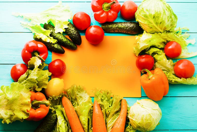 Different Vegetables on Kitchen Table with Recipe List and Copy Space ...
