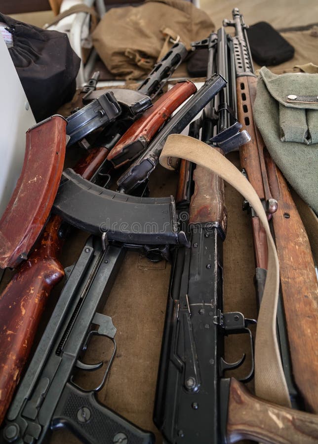 Different Weapons Lie On The Table. Old Stock Image - Image of metal ...