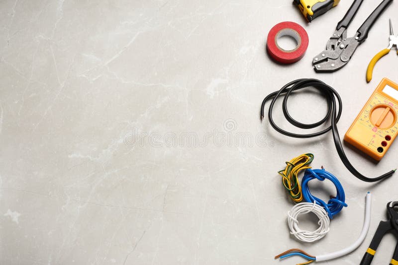 Different Wires and Electrical Tools on Light Grey Marble Table, Flat ...