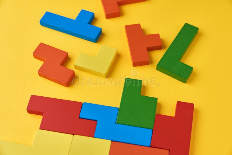 Different Wooden Blocks on Yellow Background. Concept of Logical ...