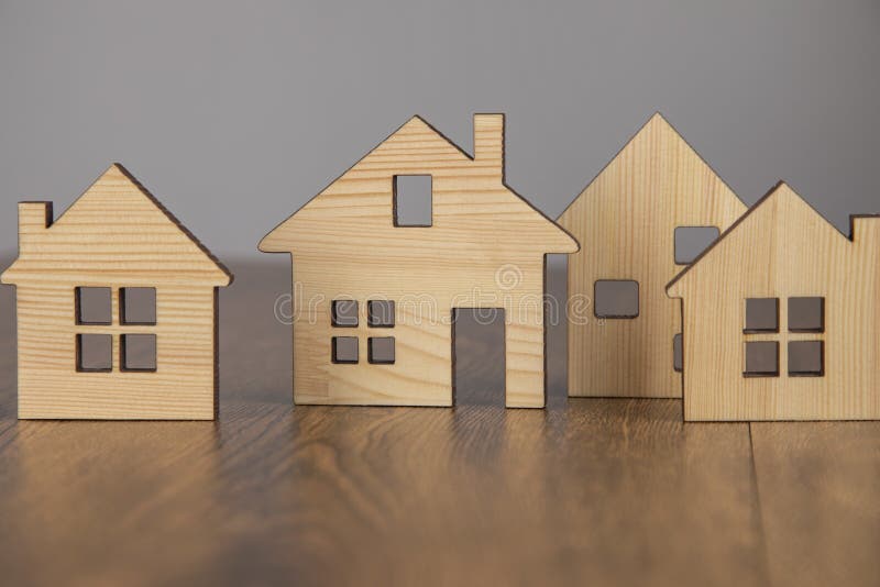 Different Wooden House Models on Table Stock Photo - Image of model ...