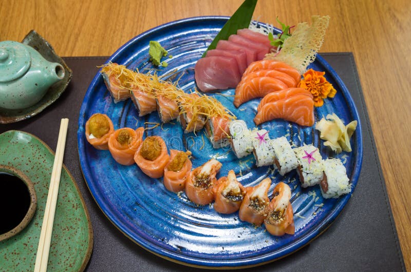 Differents Japanese Sushi on a Elegant Blue Plate Stock Photo - Image ...