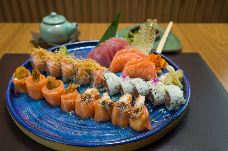 Differents Japanese Sushi on a Elegant Blue Plate Stock Photo - Image ...