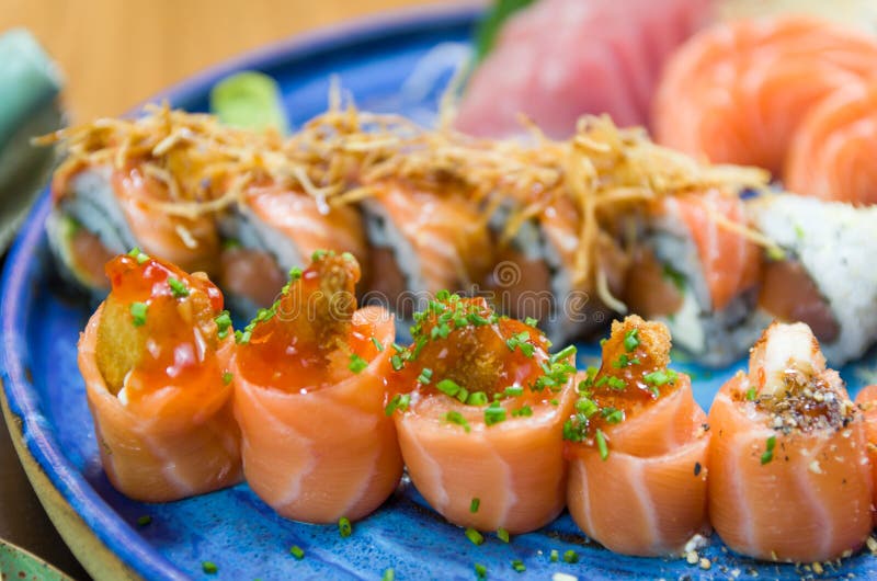 Differents Japanese Sushi on a Elegant Blue Plate Stock Photo - Image ...