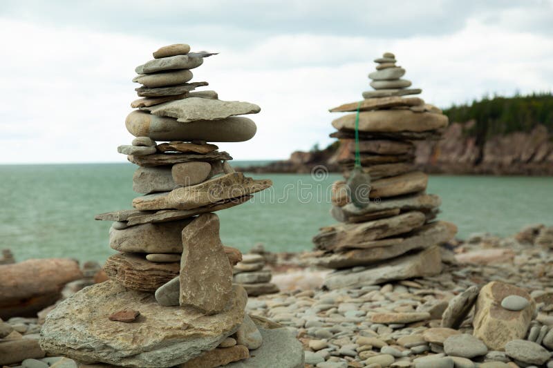 2 Diffferent Stacks of Rocks Stock Image - Image of background, lake ...