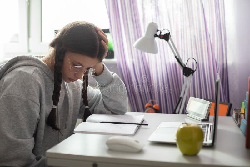 A Difficult School Assignment To Solve. a Teenage Girl Learns. Stock ...