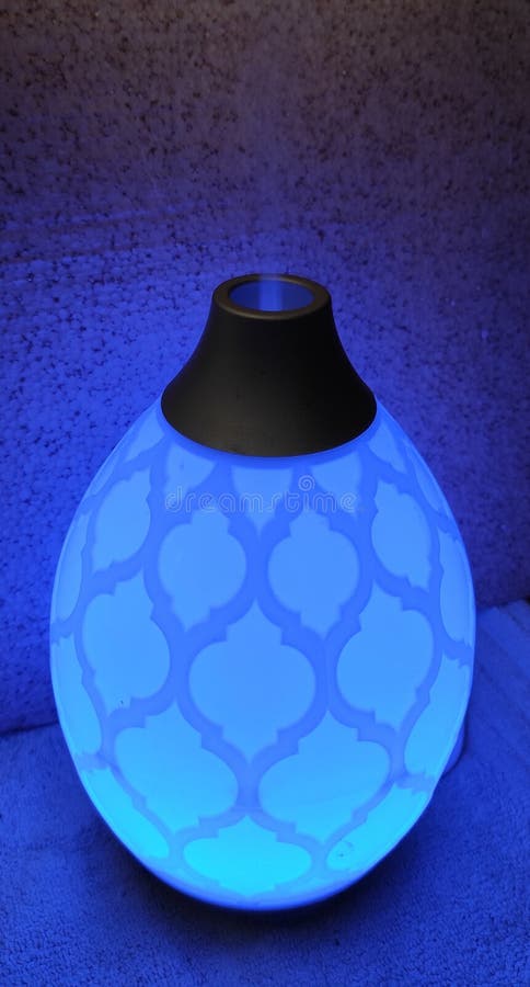 Diffuser with Aroma Therapy that is Emitting Smoke Stock Photo - Image ...