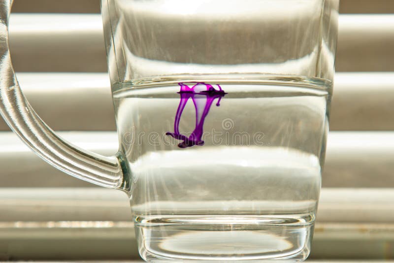 Diffusion of Blue Ink in a Transparent Glass Cup with Clear Water ...