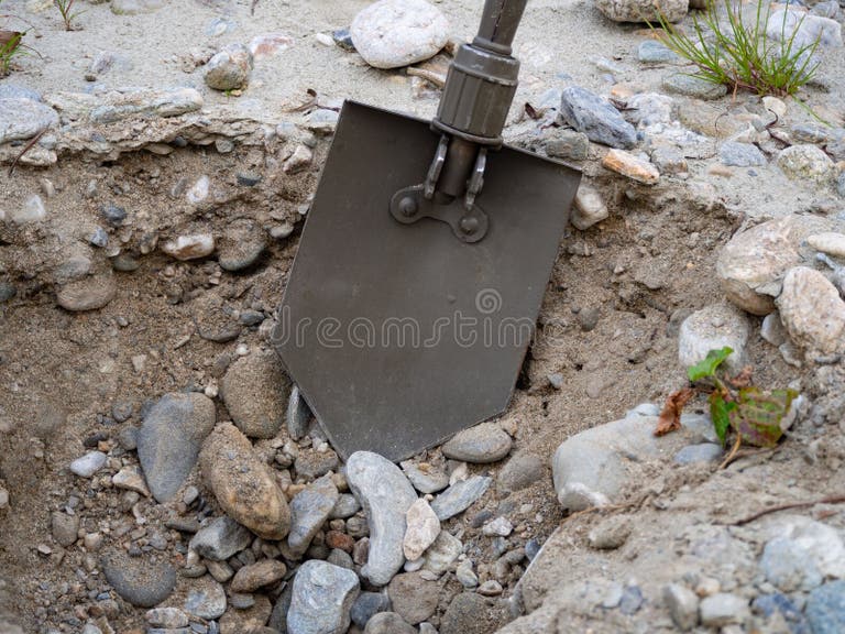 Dig a hole with a spade stock photo. Image of environment - 170706540