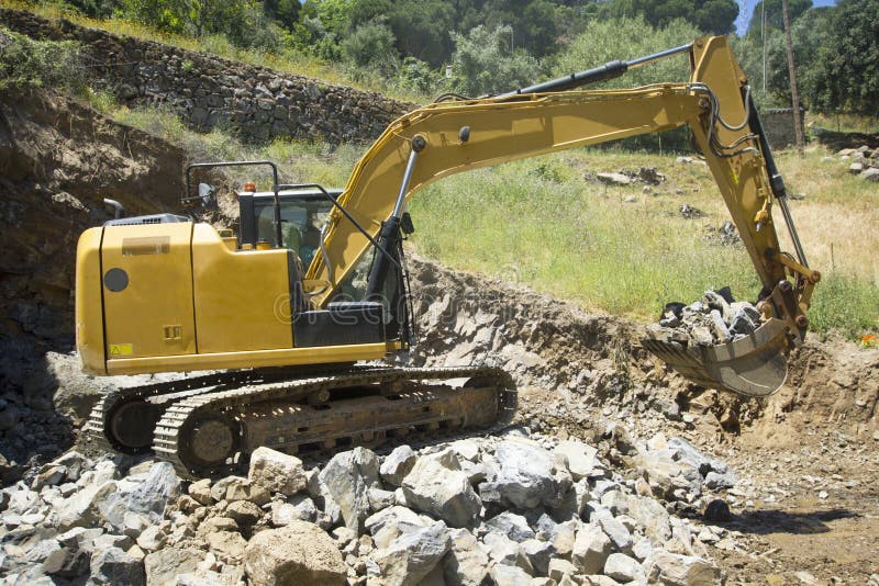 Digger Bucket Full of Rocks Stock Photo - Image of full, equipment ...