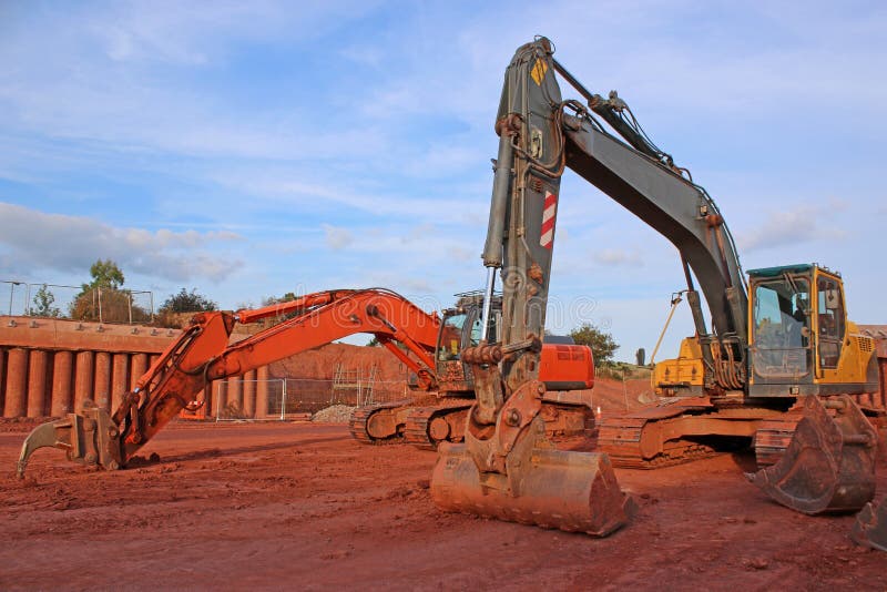 Digger on a Construction Site Stock Photo - Image of hydraulic, dump ...