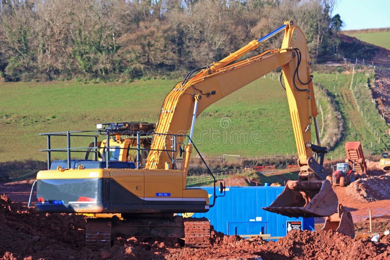 Digger on a Construction Site Stock Image - Image of working, dump ...