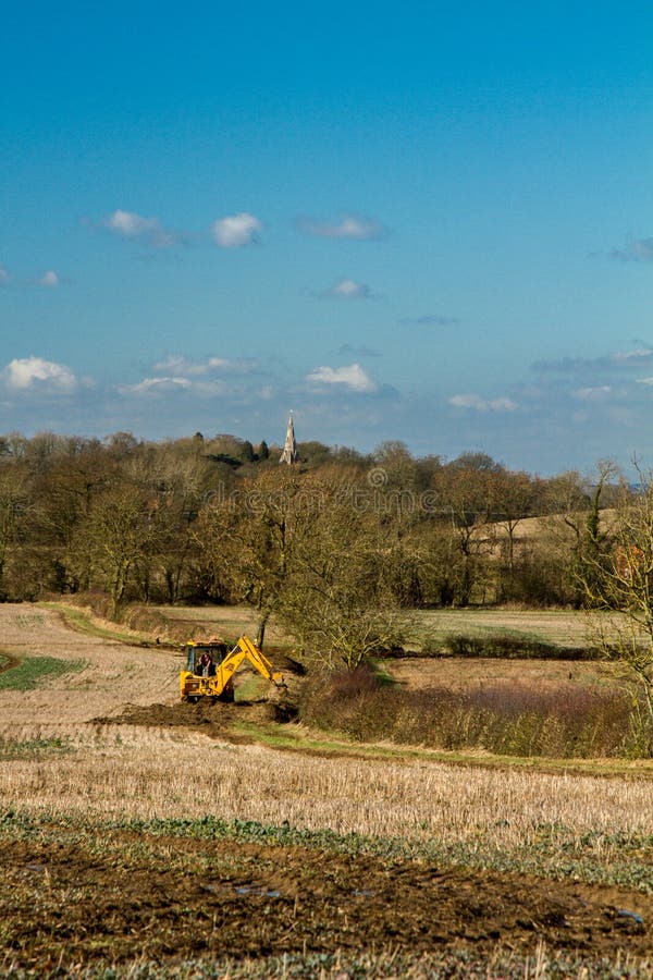 Digger in Countryside Clearing Ditch Editorial Photo - Image of dirt ...