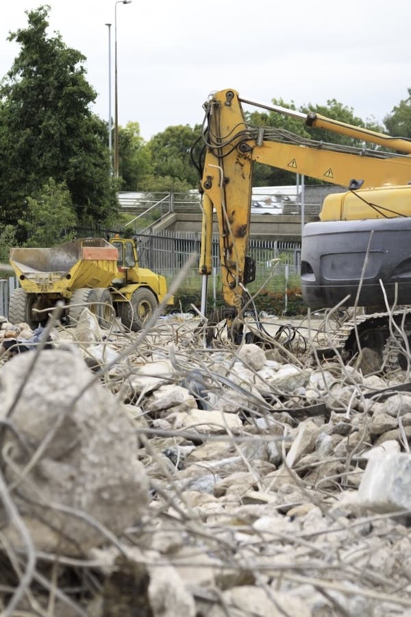 Digger Demolishing a Building Stock Photo - Image of work, diggers ...