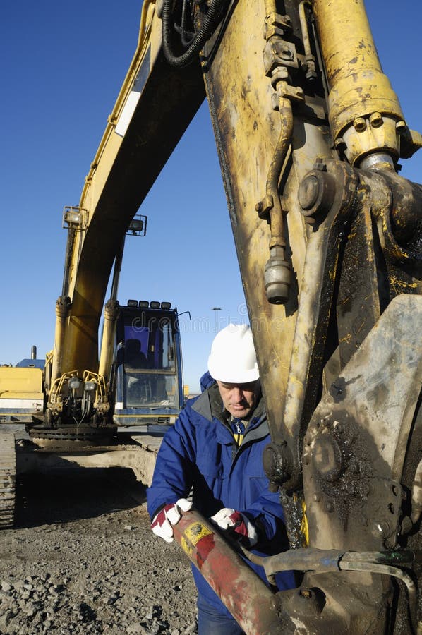 Digger and Driver Close-ups Stock Image - Image of machinery ...