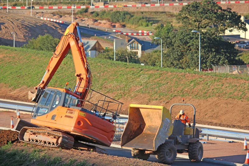 Digger on a Construction Site Stock Photo - Image of bank, excavator ...
