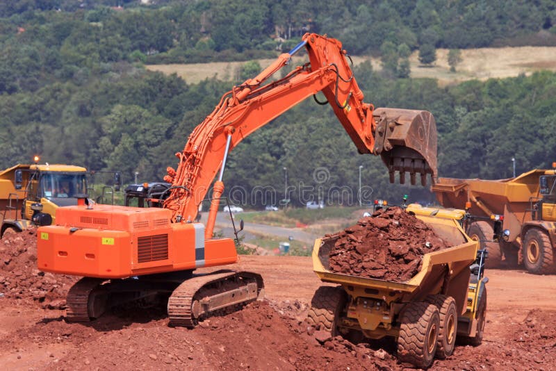 Digger and Dump Truck stock image. Image of bulldozers - 61528213