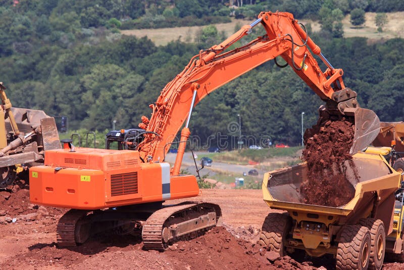 Digger and Dump Truck stock image. Image of roadworks - 64211309