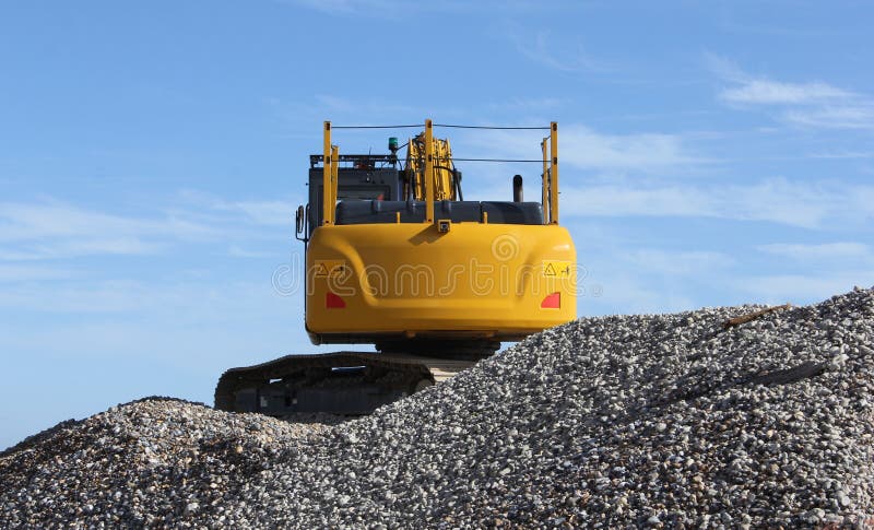 Digger Excavator on the Beach Stock Photo - Image of surf, engineering ...