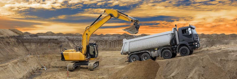 Digger and Excavator at Work in Construction Site Stock Photo - Image ...