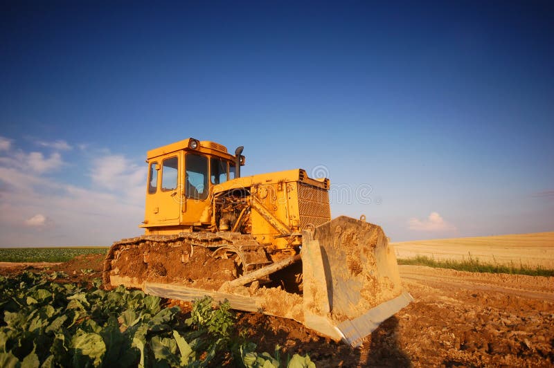 Digger on the field stock photo. Image of blue, county - 17703358