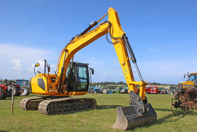Man Standing in a Digger Bucket Stock Photo - Image of digger, stone ...